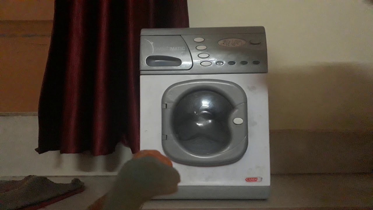 Wash matic toy washing machine and T rex and small t rex - YouTube
