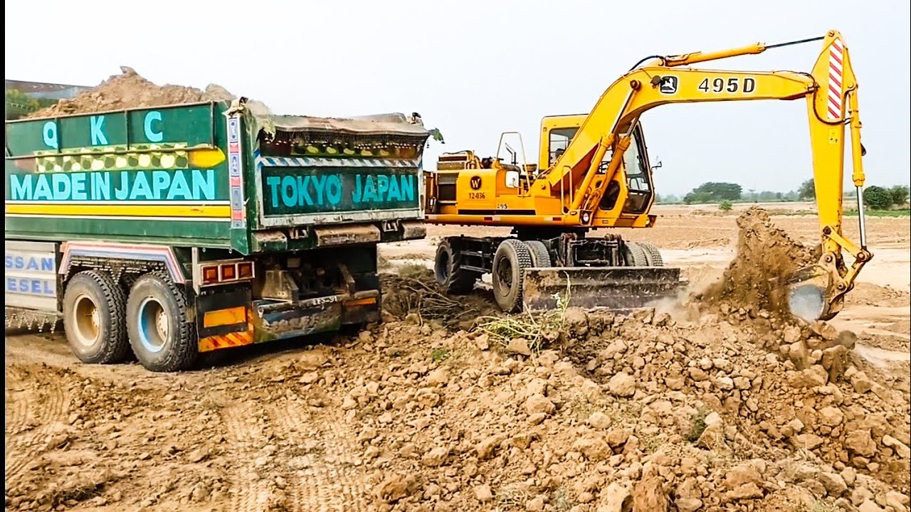Small excavator filling - huge truck damper 30, 2019 - YouTube