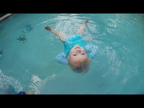 2-year-old twins swim on last day of swim lessons - YouTube
