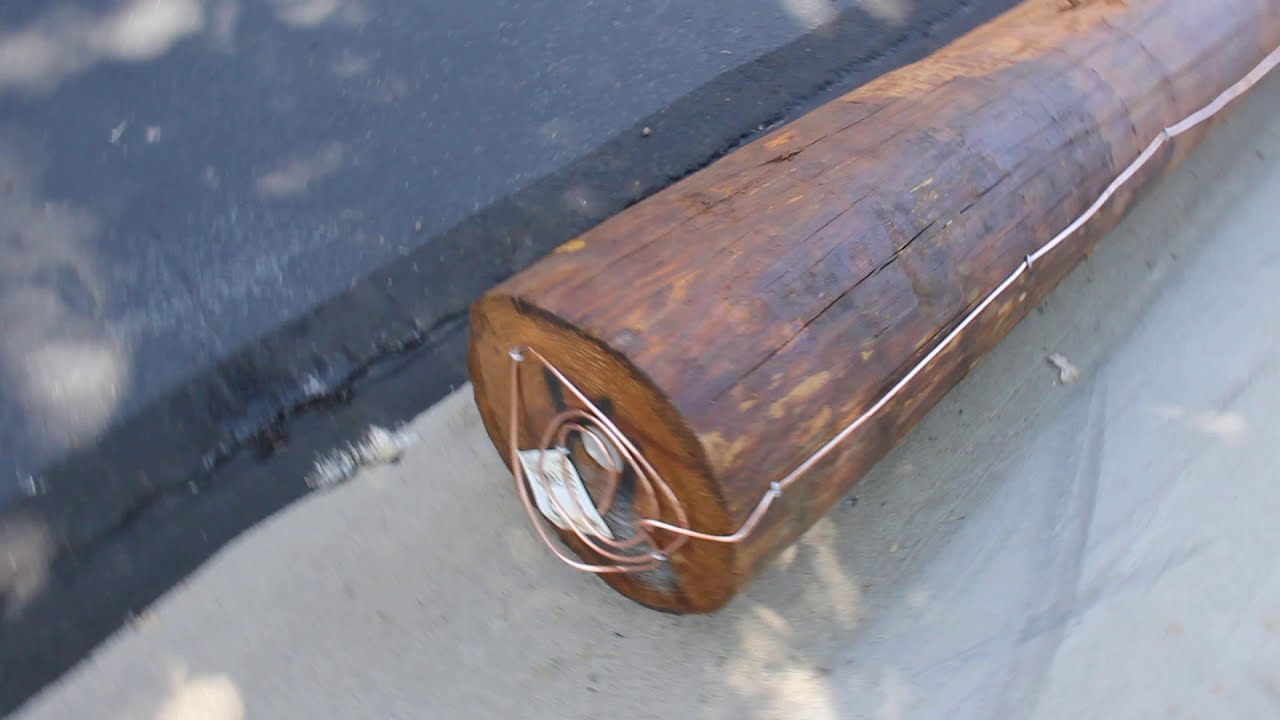 Grounding wire at the underground/bottom side of a utility pole - YouTube