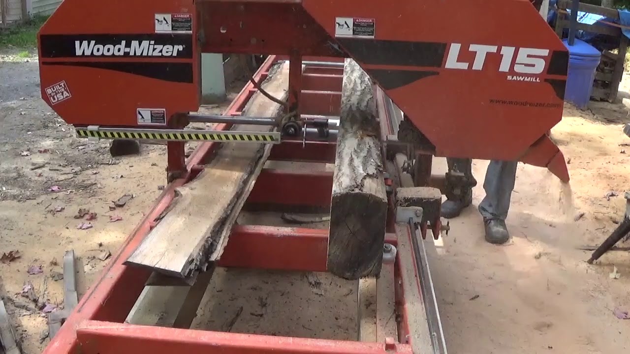 Cutting red oak log into boards for molding on the Woodmizer LT15 9/24 ...