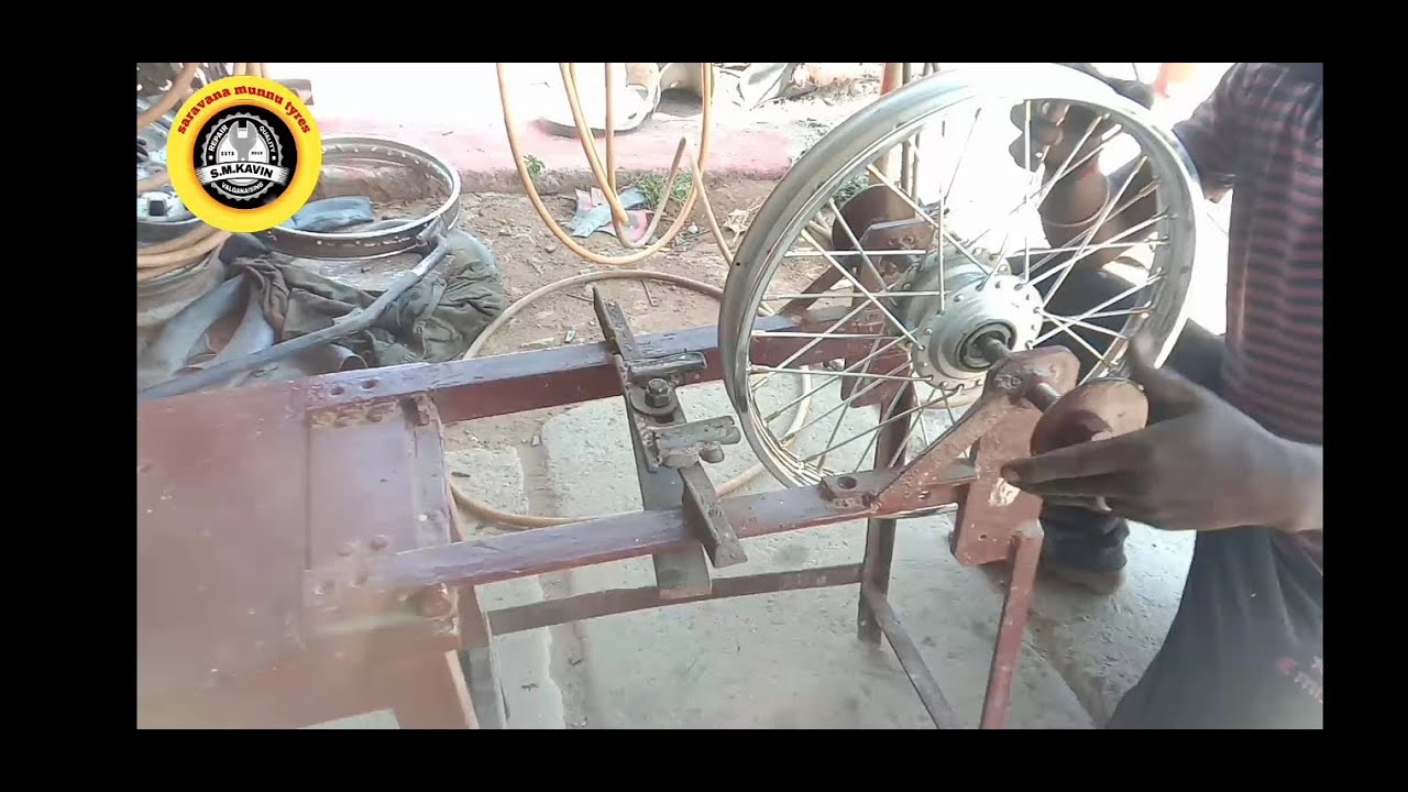 Two wheeler wheel alignment - YouTube