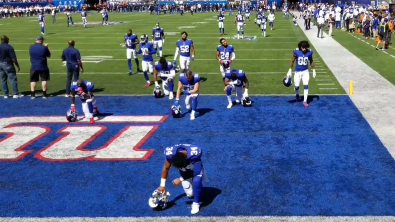 The New York Football Giants running out of the tunnel at MetLife ...