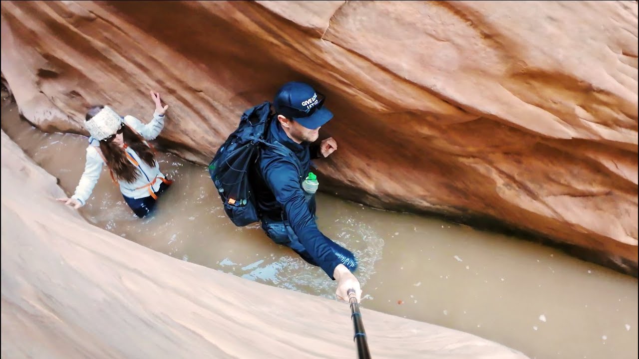 Hiking through flooded slot canyons - YouTube