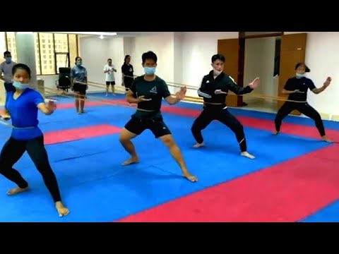 Karate exercises legs and hands speed and strength with rubber. - YouTube