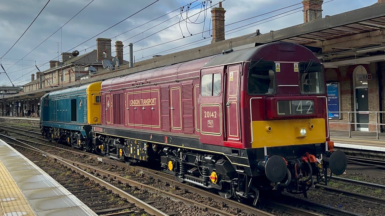 London transport liveried 20142 and BR blue liveried 20189 idle through ...