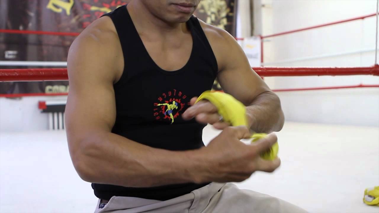 Hand Wrapping with Muay Thai Champion Coban Lookchaomaesaithong - YouTube