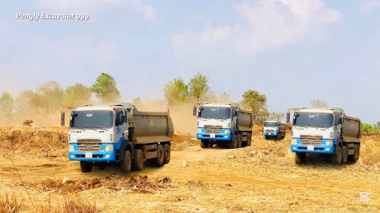 Large earthmoving trucks for construction and development work. - YouTube