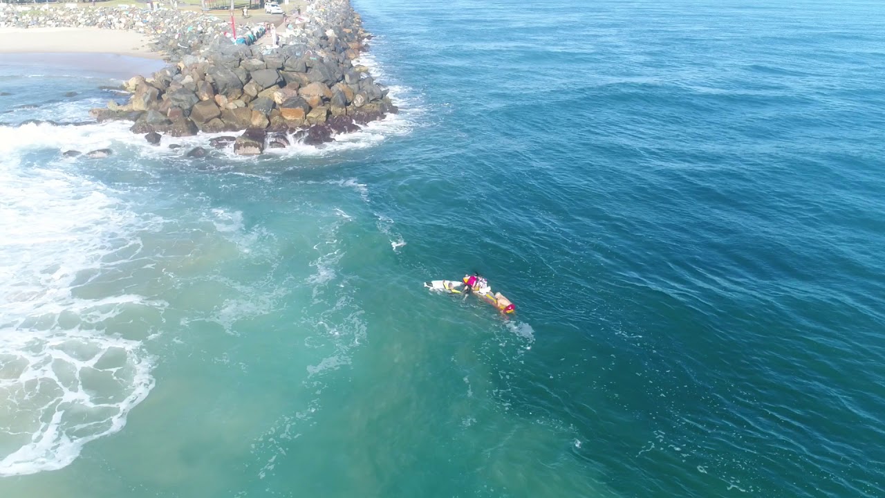 Swimmers Saved From Rip by Off-Duty Lifeguards and Surfer - YouTube
