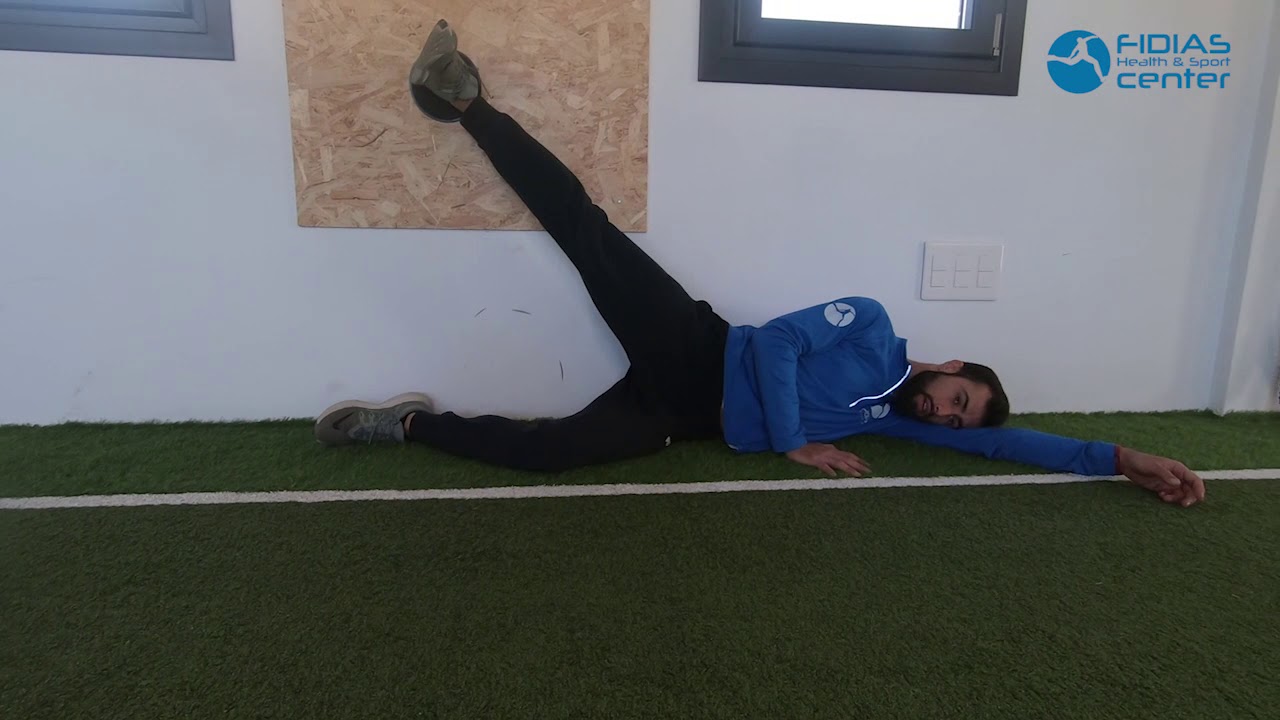 Abducción de cadera en decúbito lateral con pared - YouTube