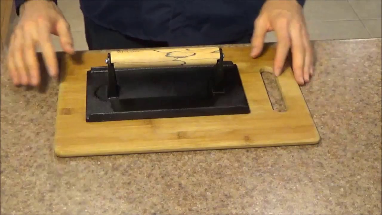 Winco SWA-9 Cast Iron Steak Weight - YouTube