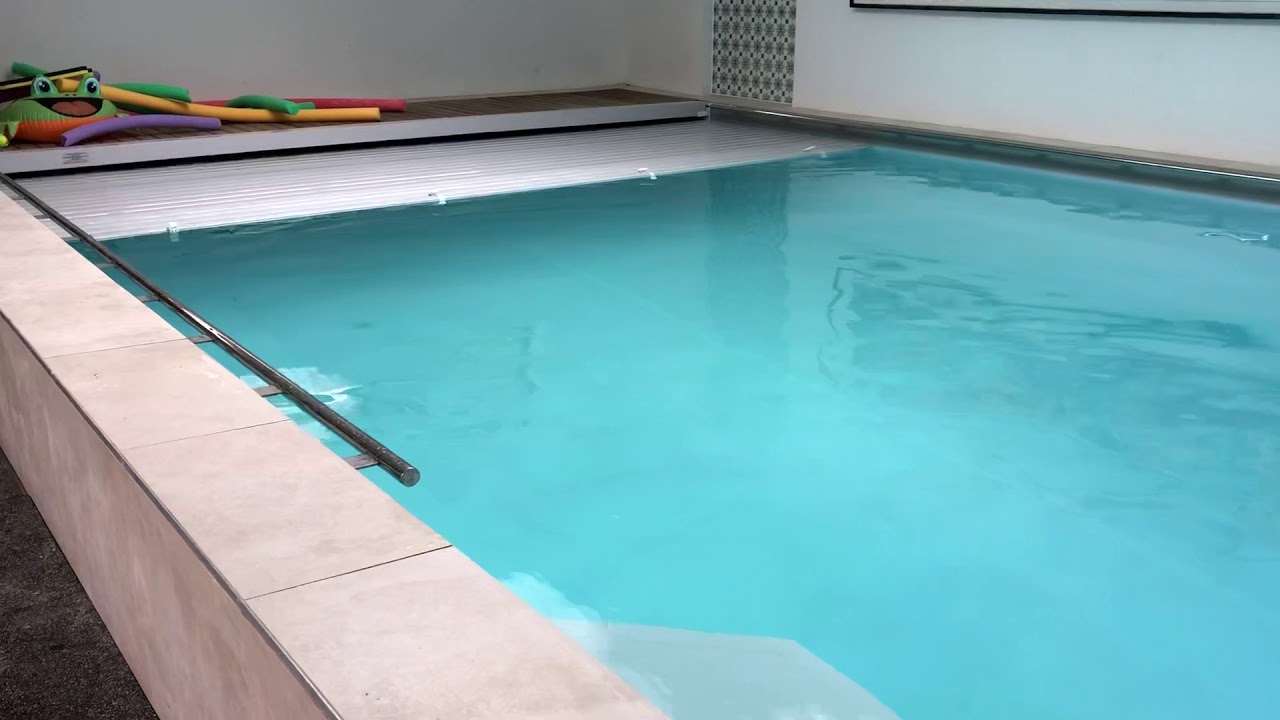 Automatic floating slatted cover. - YouTube