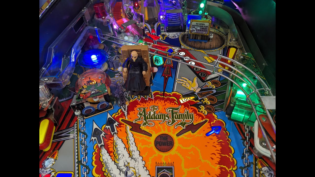 Adjusting cabinet flipper switches: This Addams Family pinball will ...