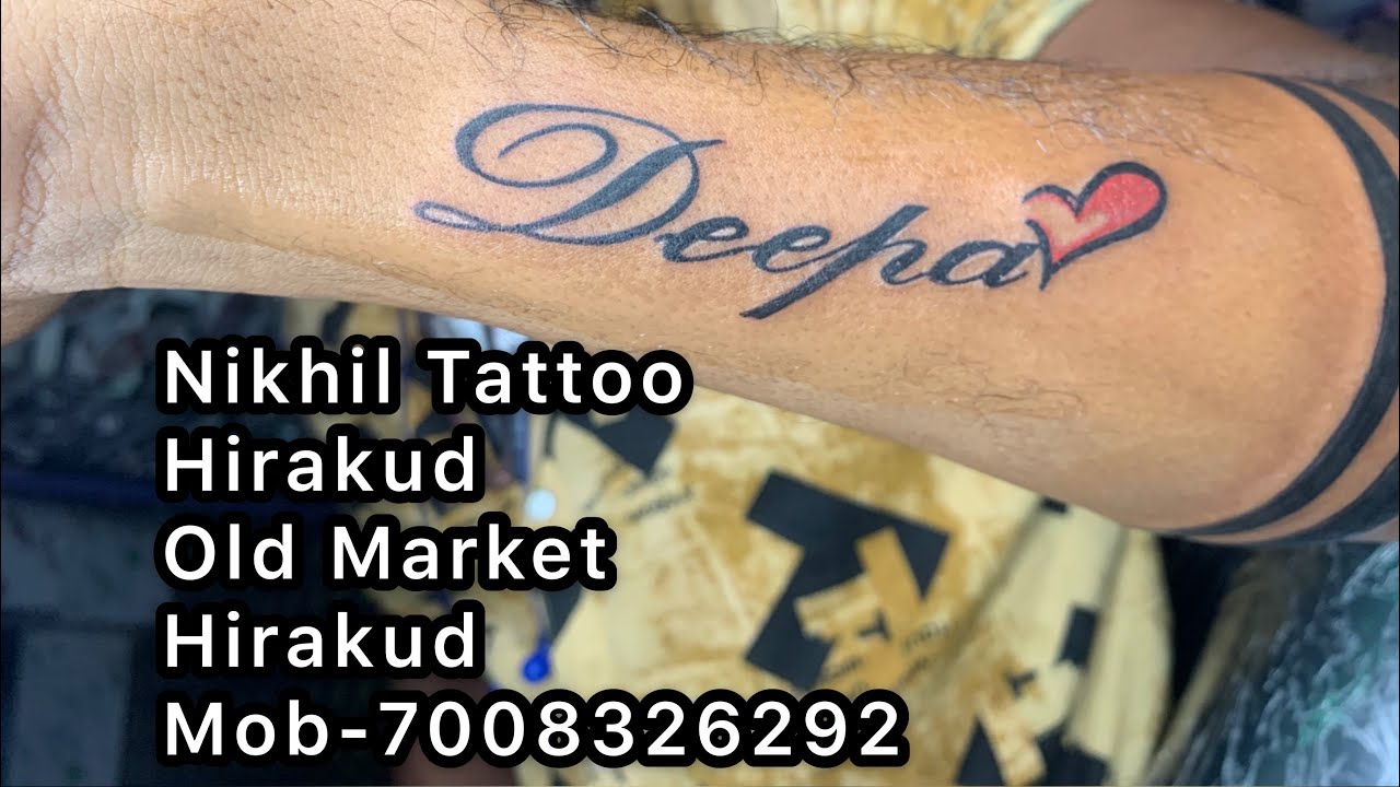 Nikhil Name Tattoo