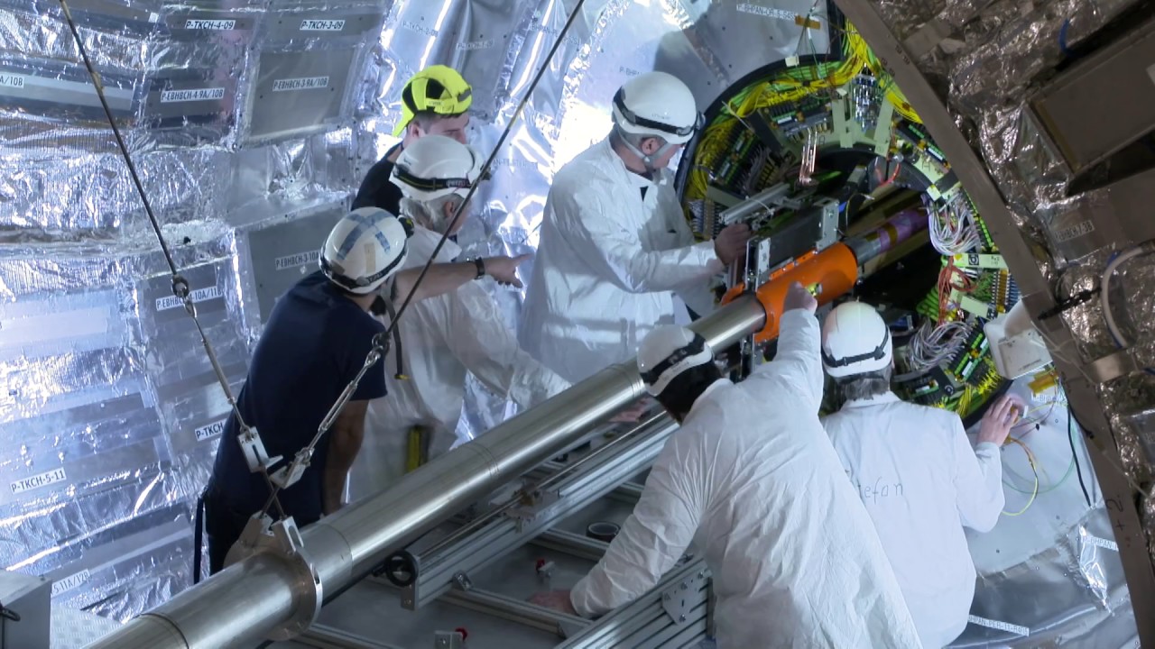 Heart surgery at the LHC: Replacing the CMS Pixel Tracker - YouTube