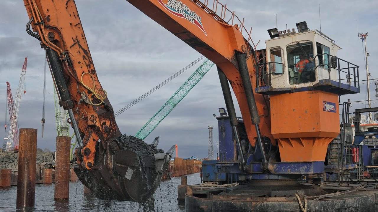 Barge mounted Demag Dredging Harbour - YouTube