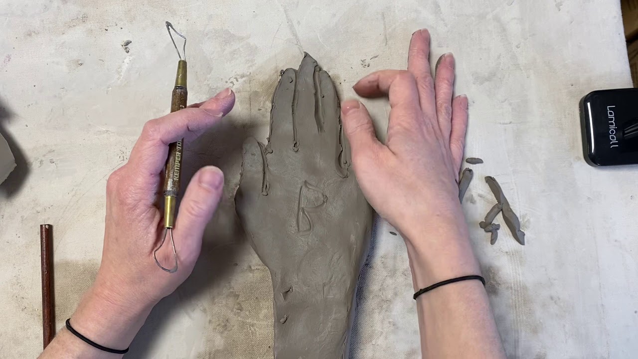 Hollowing technique/ making hands out of clay step 1 - YouTube