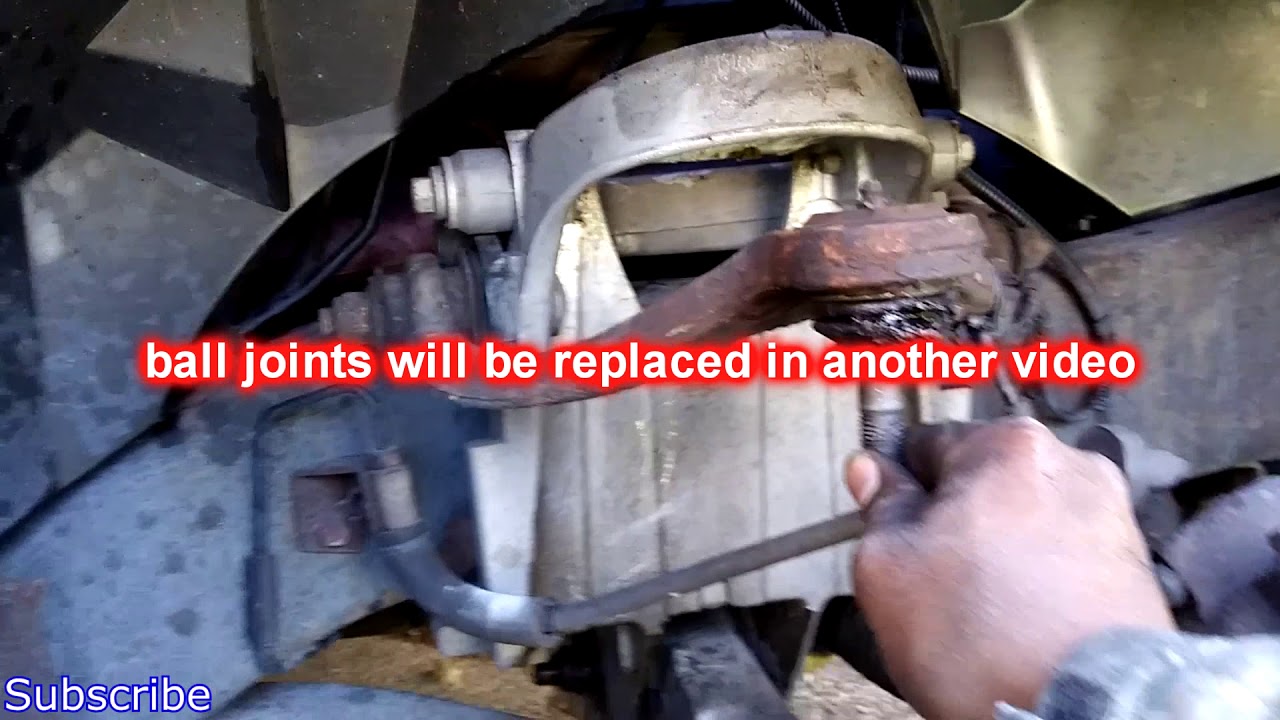 03 Lincoln town car front strut replacement - YouTube