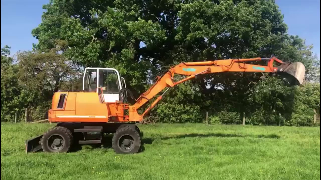 BENMAC WHEELED EXCAVATOR FOR SALE - YouTube