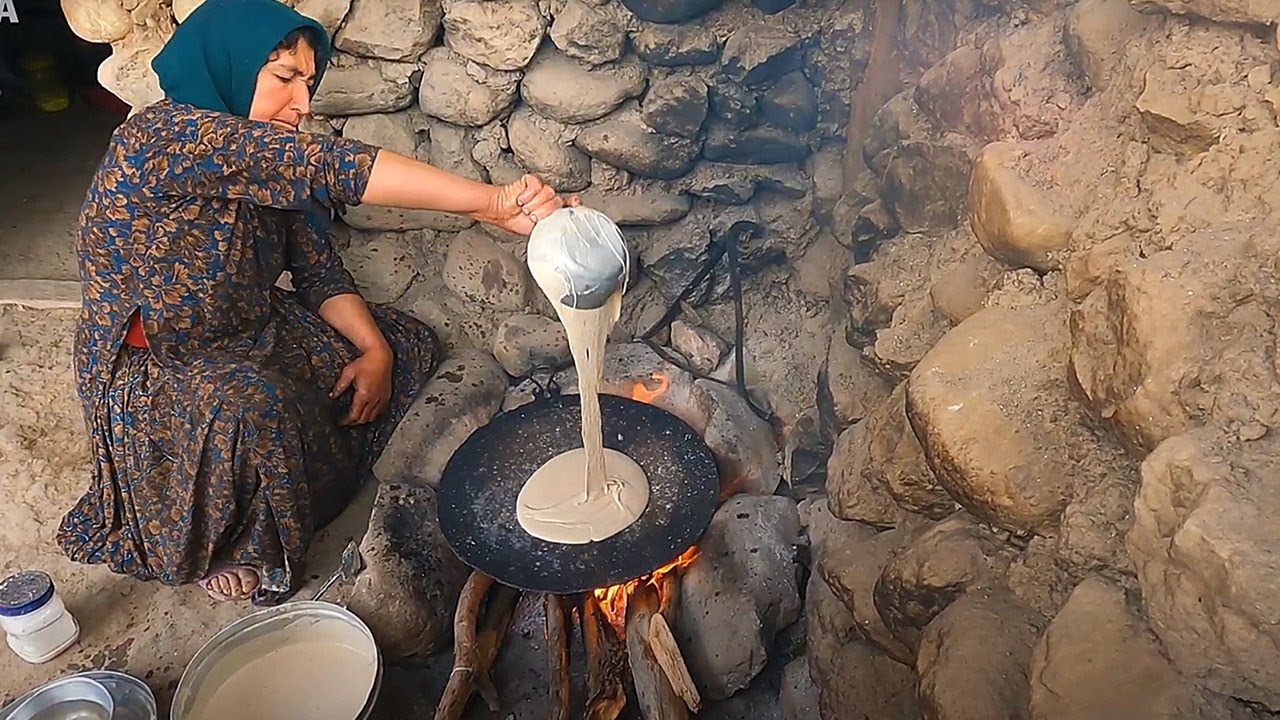 Baking bread by a nomadic woman - Barkoo bread - YouTube