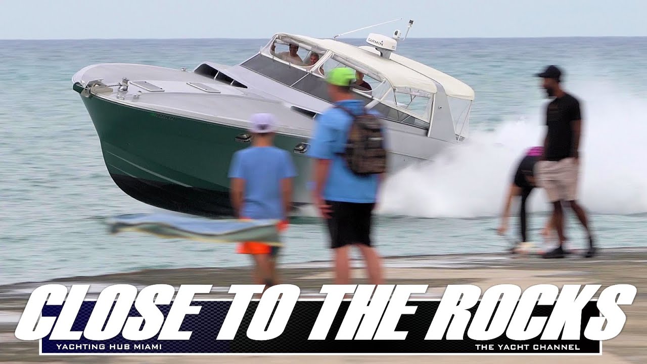 MAGNUM 50 HUGGING THE CURVE AT FULL SPEED ROOSTERTAIL HAULOVER INLET ...