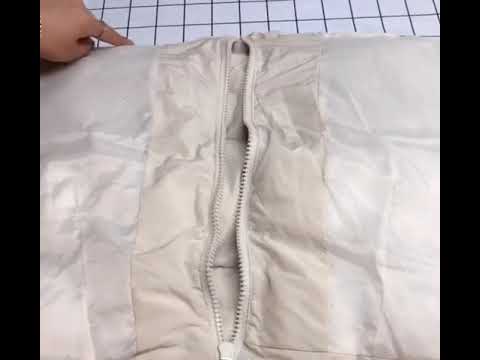 Cutting up down jacket for recycling - YouTube