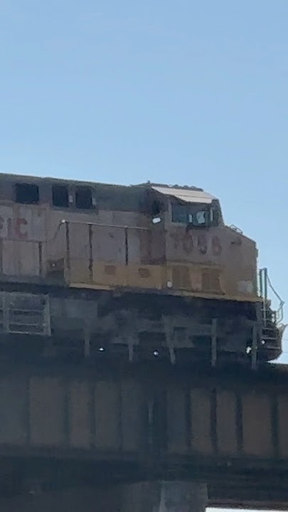 UP 7088 leads over the bridge in Geneva #railroad #railfan #railcars - YouTube