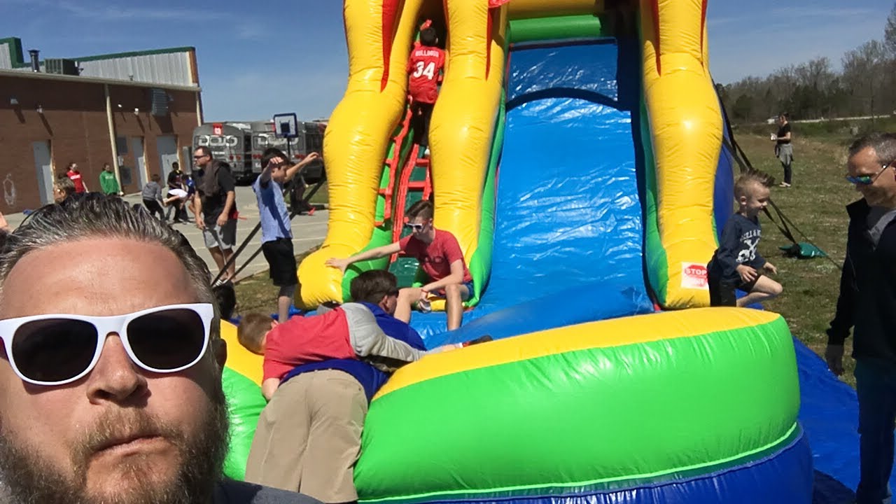 Kids go crazy on bounce slide - YouTube