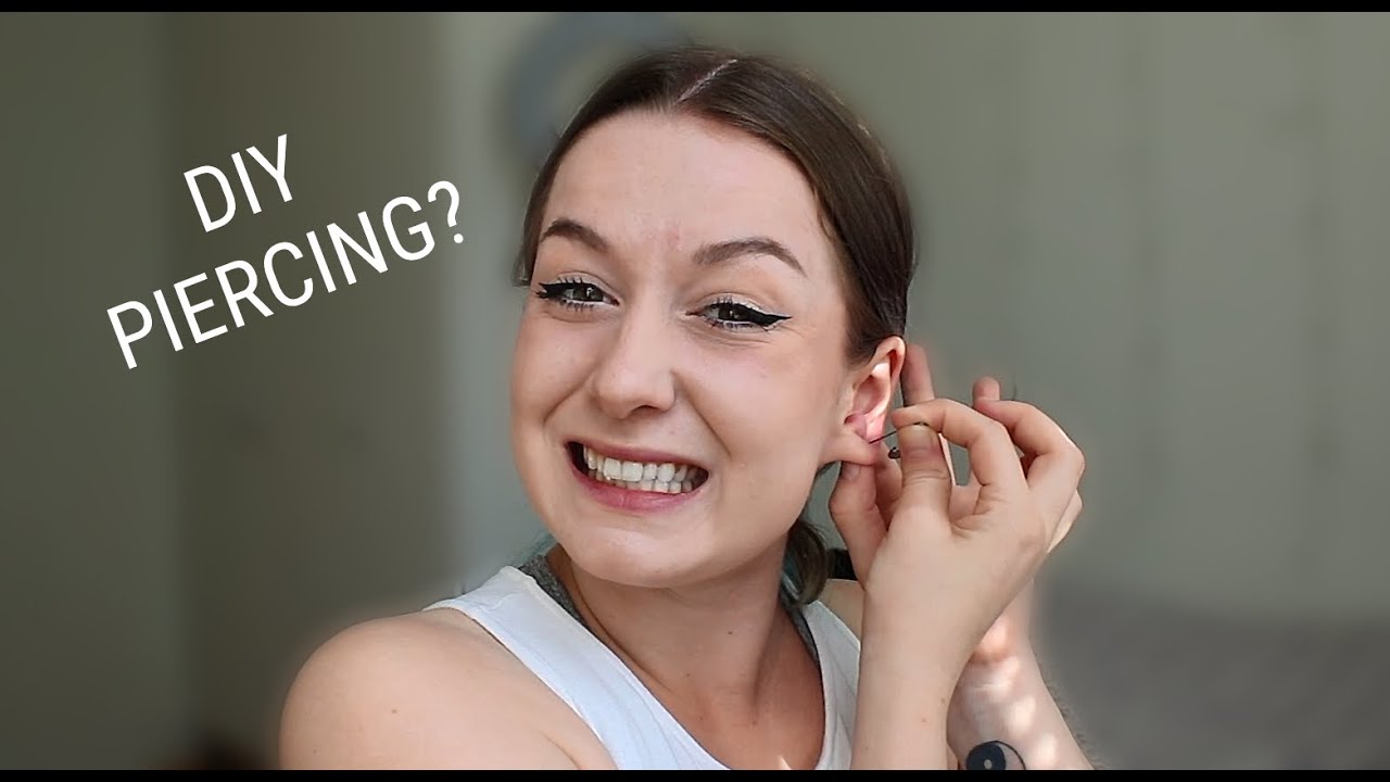 PIERCING MY OWN EARS!?! At home ear piercing. - YouTube
