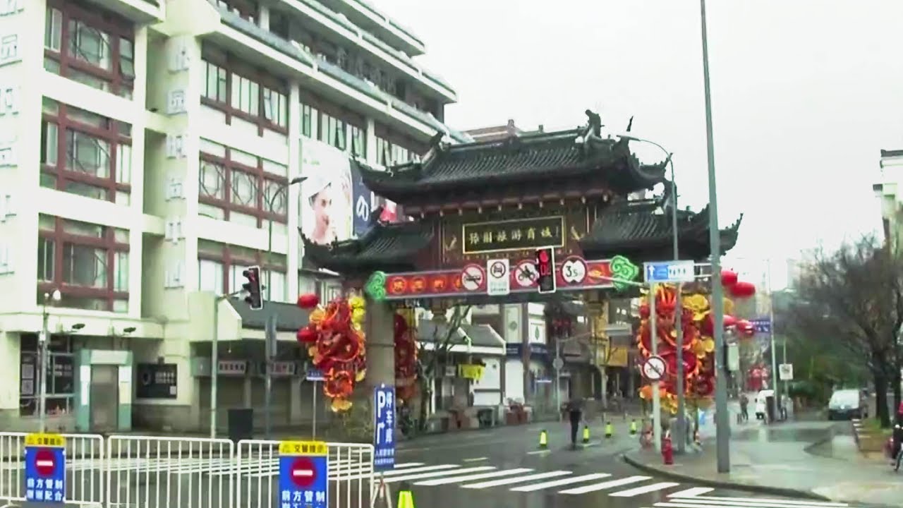 Wuhan has implemented more strict measures for COVID-19 outbreak - YouTube