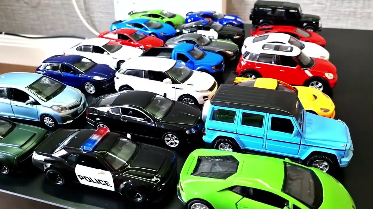 Large selection of cool model cars being shown in hand - YouTube