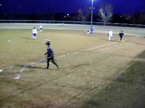 02-27-10 Emily Clontz shot to right field tips off Second base glove ...