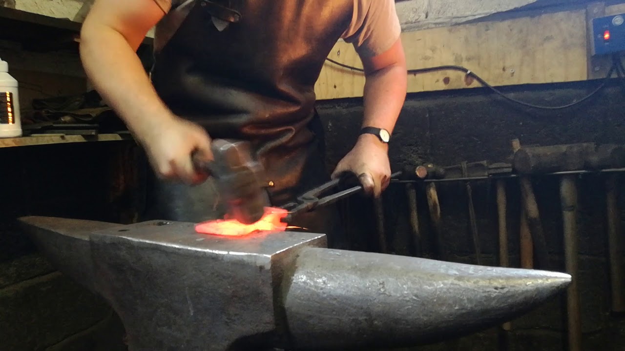 Forging an axe - YouTube