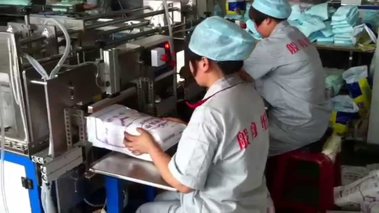 disposable mattress packaging machine,double outputs,disposable ...