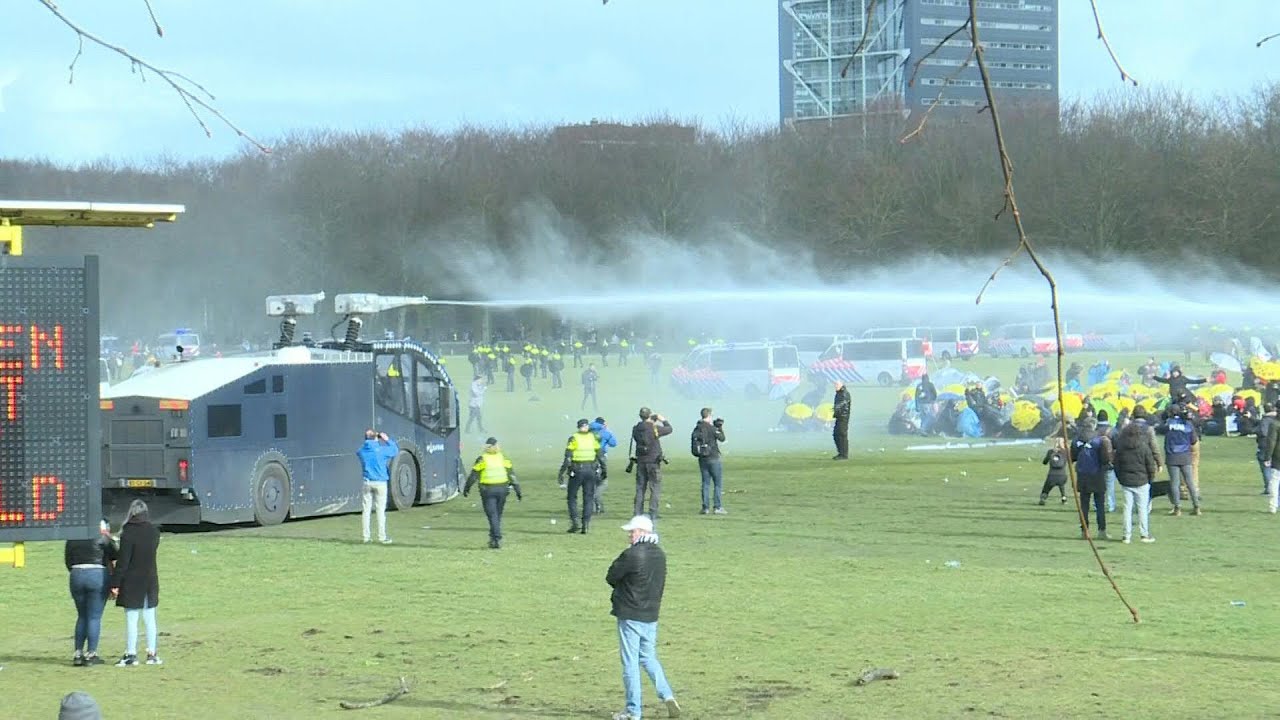 Clashes in the Netherlands as police use water cannon to disperse anti ...