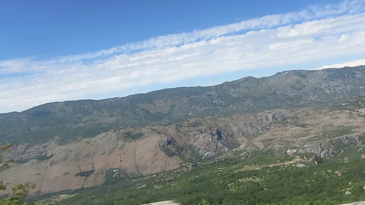 Driving through the Montenegro countryside, Ostrog Monastery ...