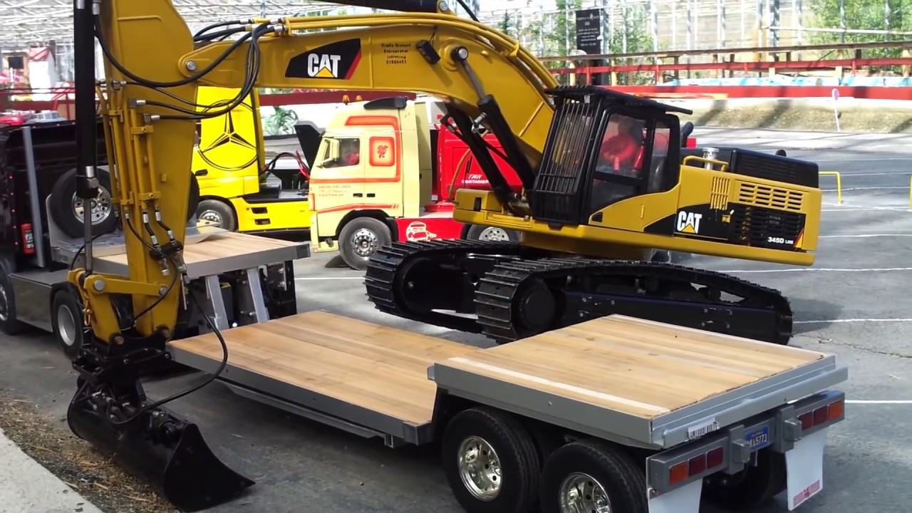 RC CAT hydraulic excavator side mounts lowbed transporter - YouTube