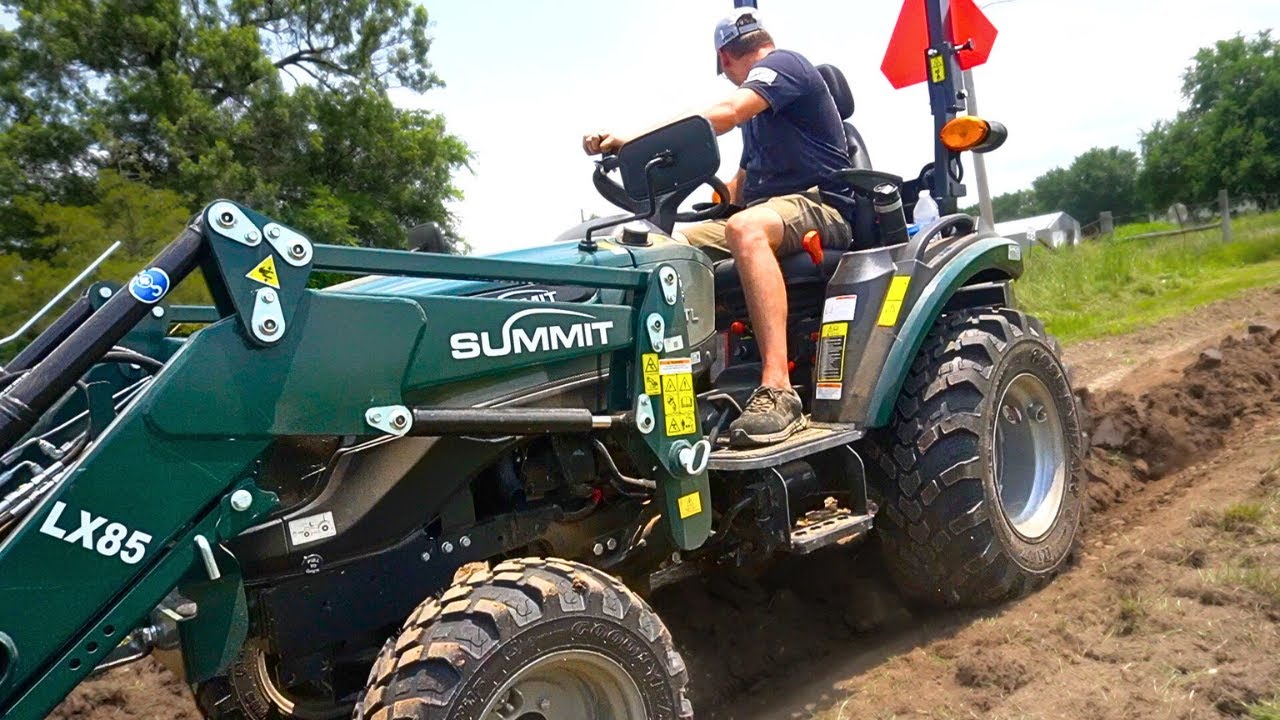 Digging a Drainage Ditch with the Summit TX25 - 50 Hour Review - YouTube