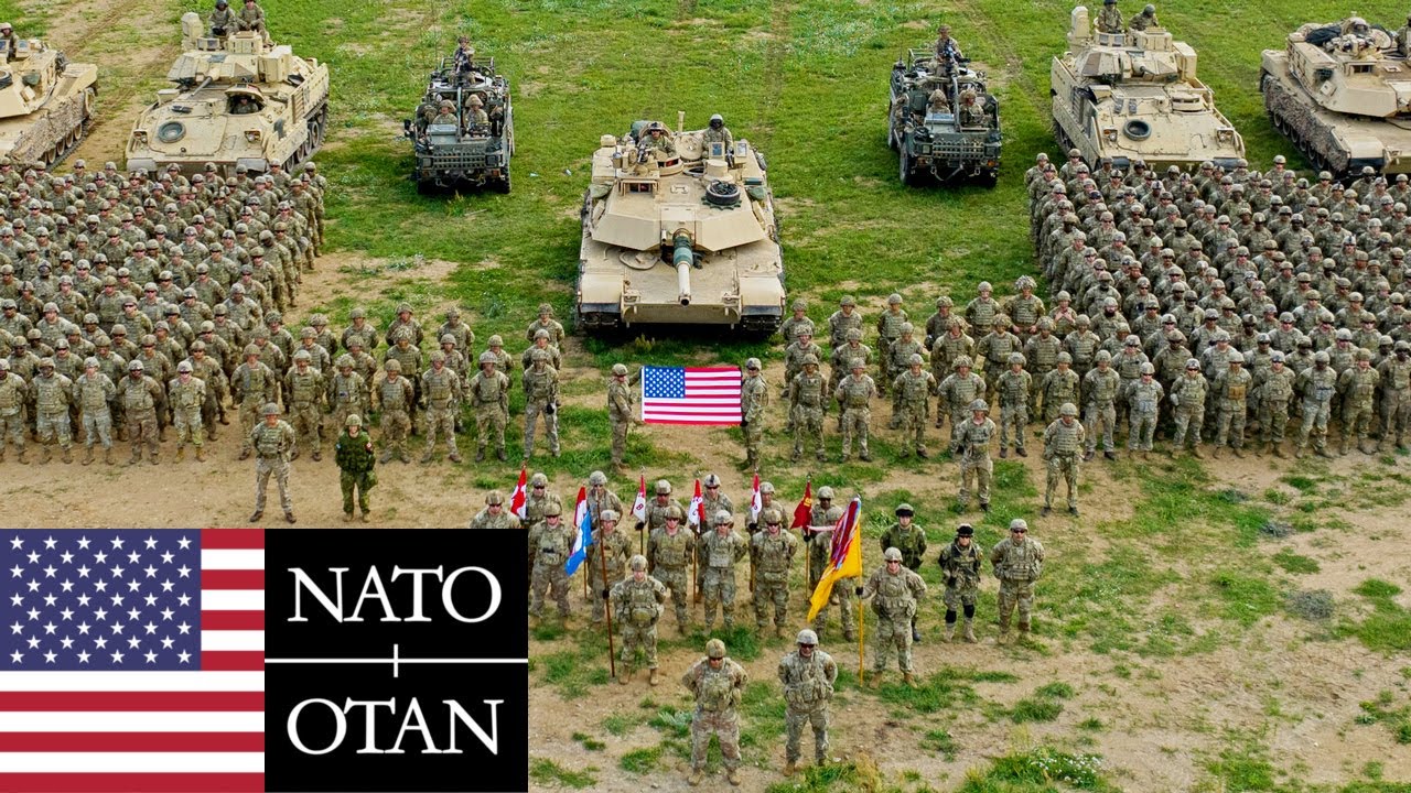 US Army, NATO. Tanks at combined arms exercises with live firing in ...