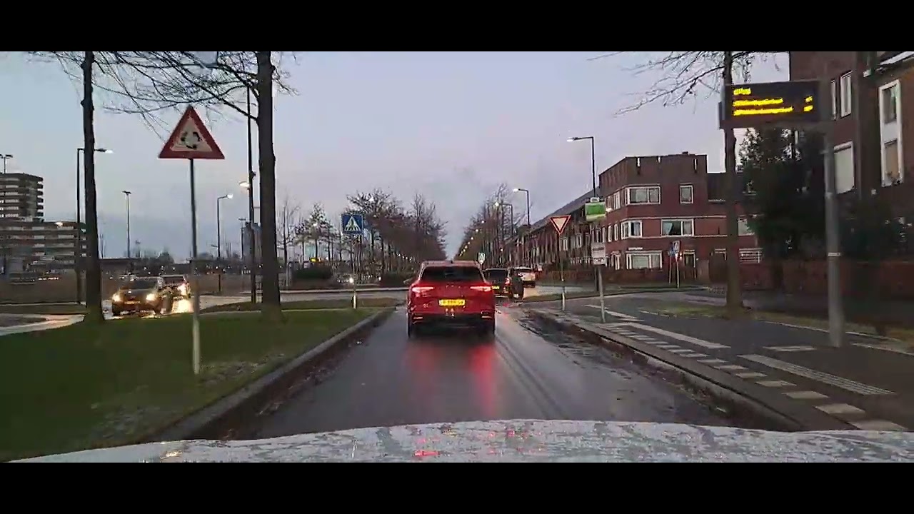 driving through the neighborhood of Nesselande in Rotterdam Netherlands ...