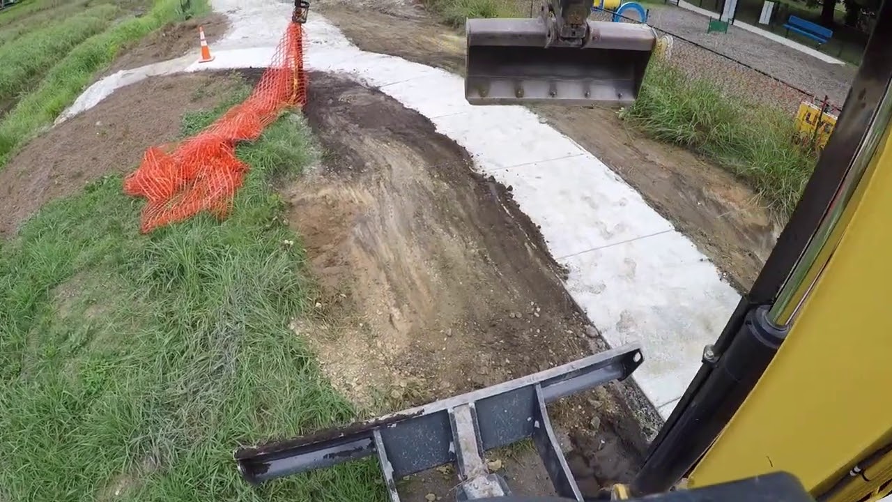 Backfilling Sidewalk And Finish Grading - YouTube