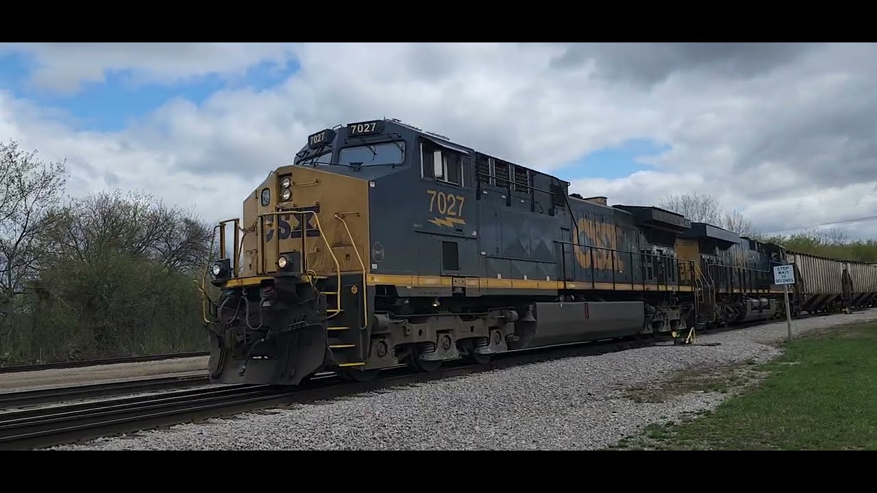 CSX 7027 & CSX 3051 Entering Saginaw Yard Northbound Grain Freight - YouTube