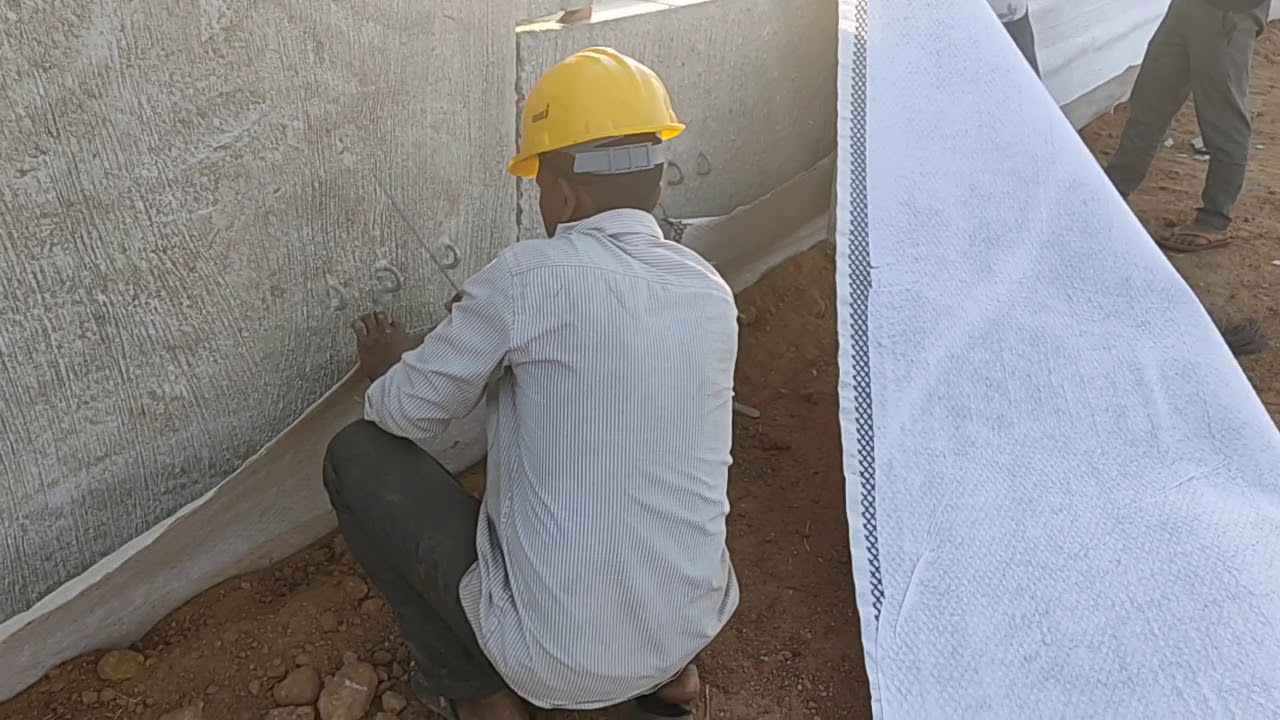 Laying of geo composite inner side on panels - YouTube
