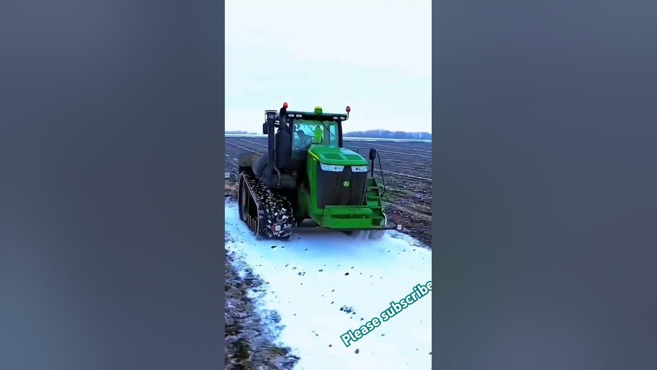 John Deere prepares the ground in the snow!" shows how John Deere tractors work in winter. - YouTube
