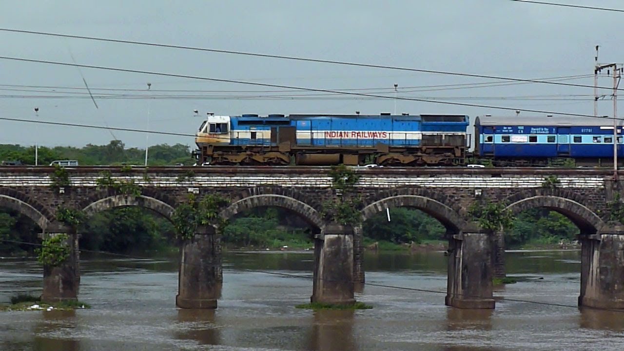 EMD GT46PAC powered Koyna Express glides over Harris Bridge!! - YouTube