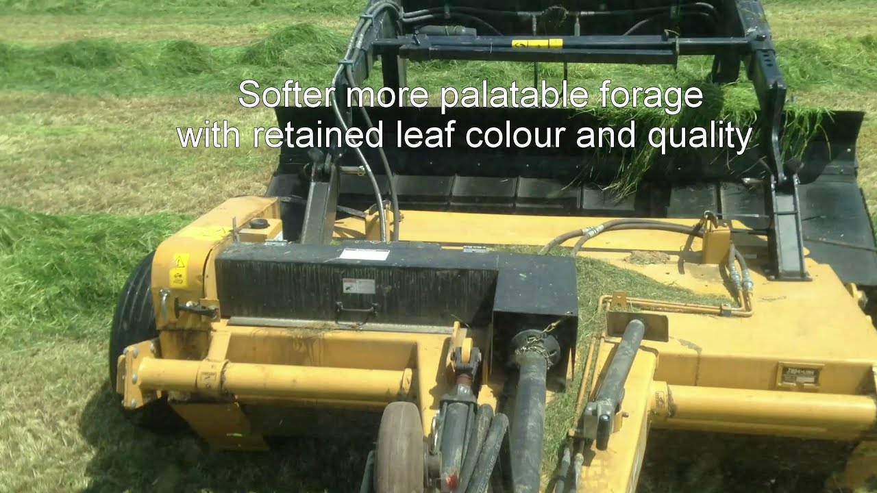 Hay & grass conditioning and tedding - YouTube