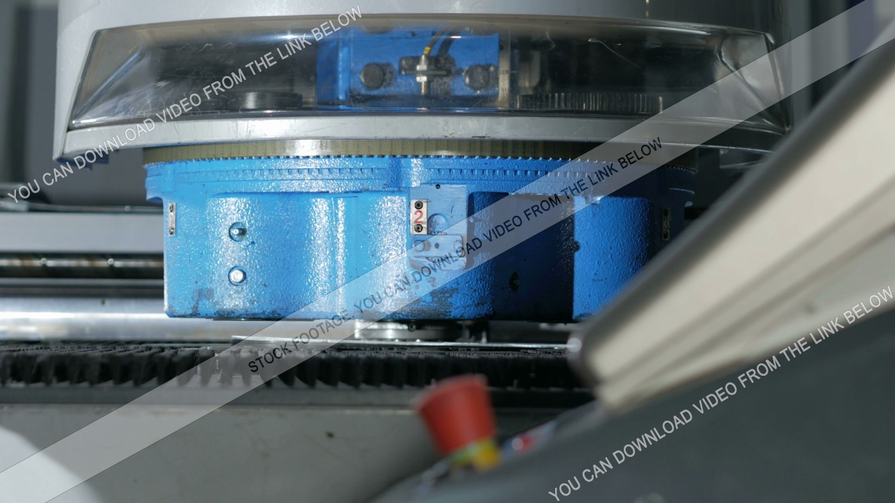Mechanical technician programming punching the machine CNC. A man ...