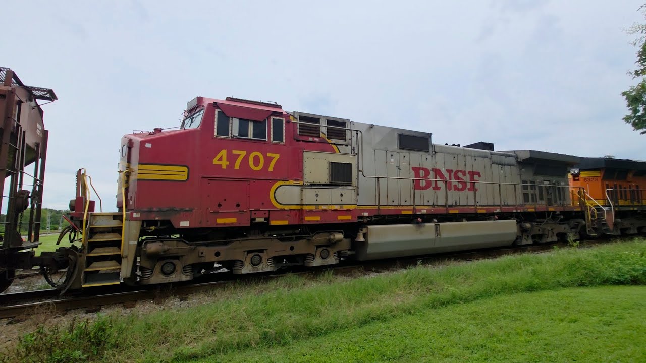BNSF War Bonnet 4707 trails 2nd on loaded grain train, going over ...