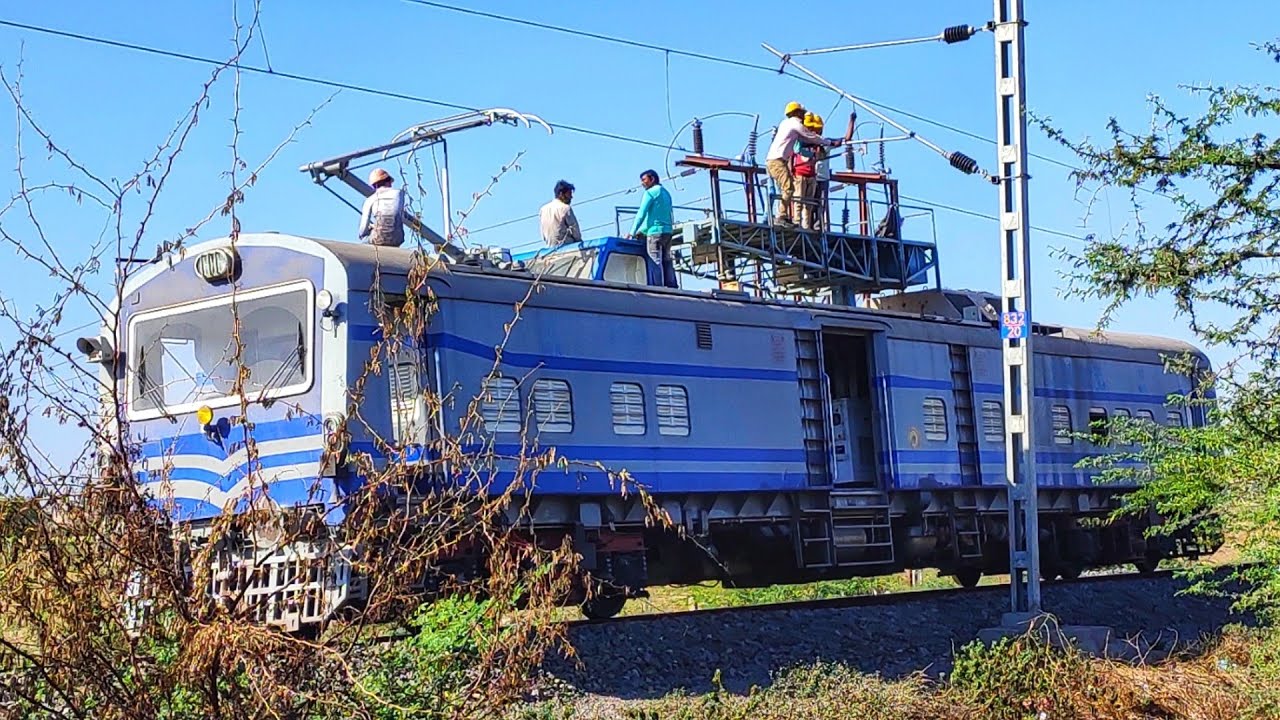 Rare sight Indian Railways OHE van DETC doing remaining electrification ...