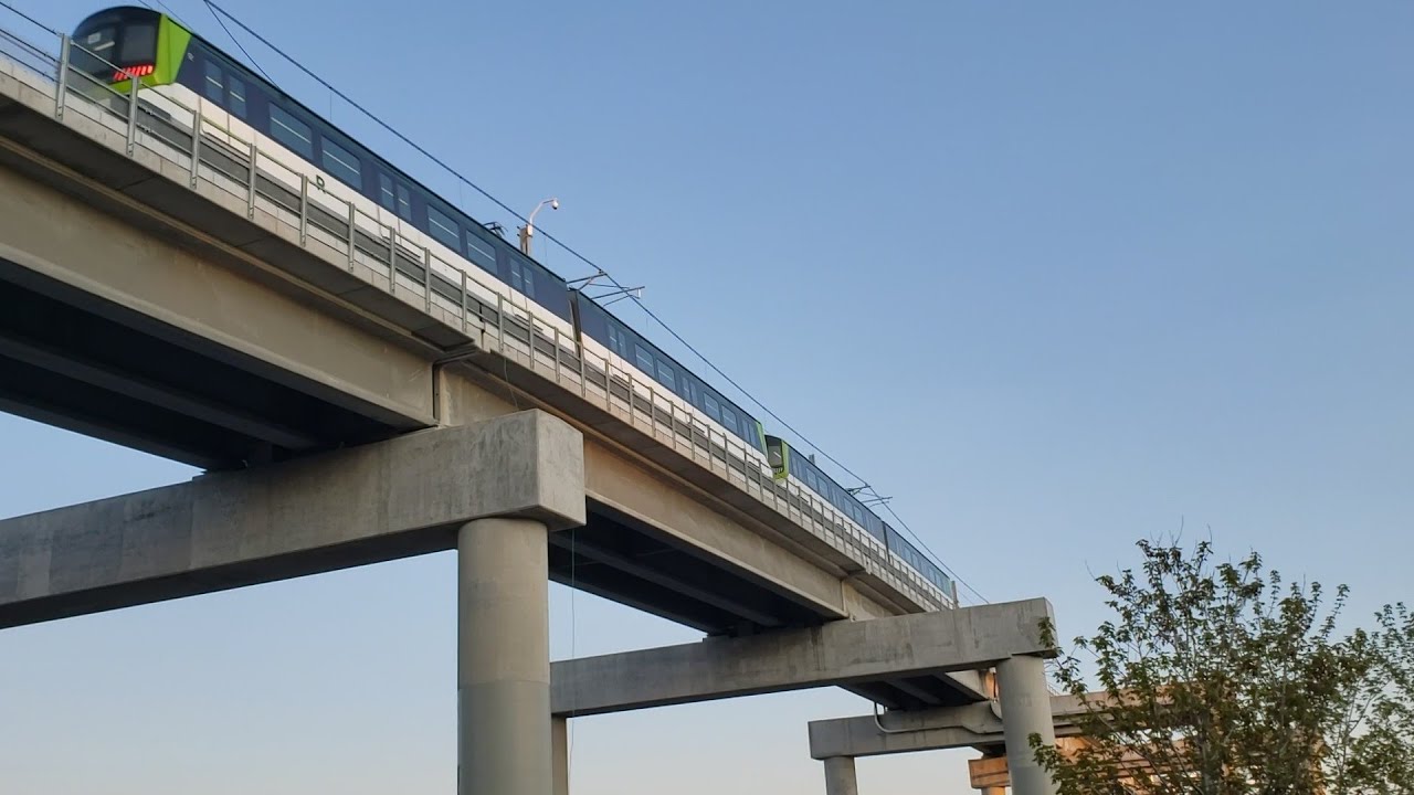 MONTREAL REM Four Car Test Train above Heavy Rail Tracks at Wellington ...